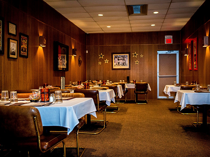 Classic supper club ambiance in full effect. White tablecloths, wood paneling, and comfortable chairs—where memories are made between bites.