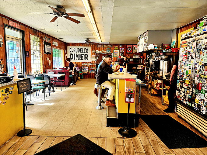 The diner's wood-paneled charm and yellow counter create the kind of atmosphere where strangers become friends over scrambled eggs.