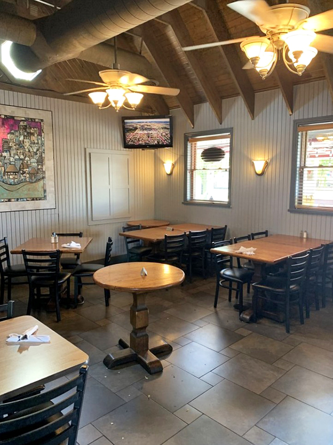 The dining room feels like the living room of that friend who actually has good taste&mdash;warm wood, gentle lighting, and not a plastic plant in sight.