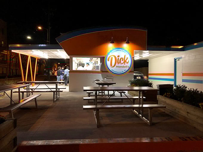 Even at night, that neon sign beckons like a lighthouse for the hungry. The empty tables won't stay that way for long.