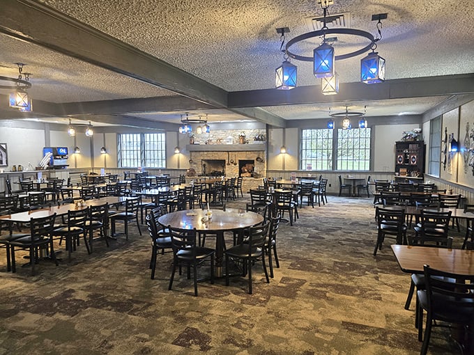 The dining room says "stay awhile" with its comfortable chairs and blue pendant lights. This is where memories are made between bites of pie.
