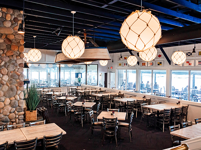 Those nautical light fixtures dangling like buoys above tables where food dreams come true. Coastal-chic without the coastal-clich&eacute;s.