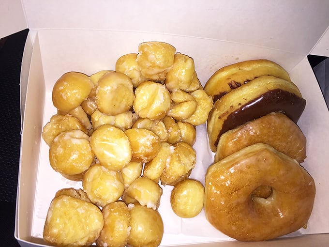 Donut holes and their full-sized companions—proof that good things come in all sizes. The perfect road trip companions for Kansas adventures.