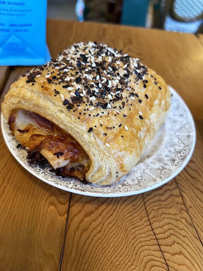 This isn't just breakfast&mdash;it's edible architecture: flaky pastry layers, savory filling, and seeds creating a morning masterpiece worth getting up for.