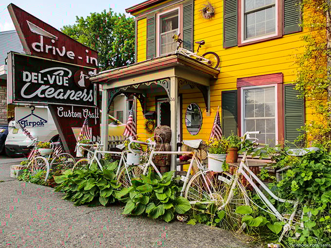 Bicycles bloom alongside hostas at this sunny yellow building, where old-school Americana meets small-town charm in perfect harmony.
