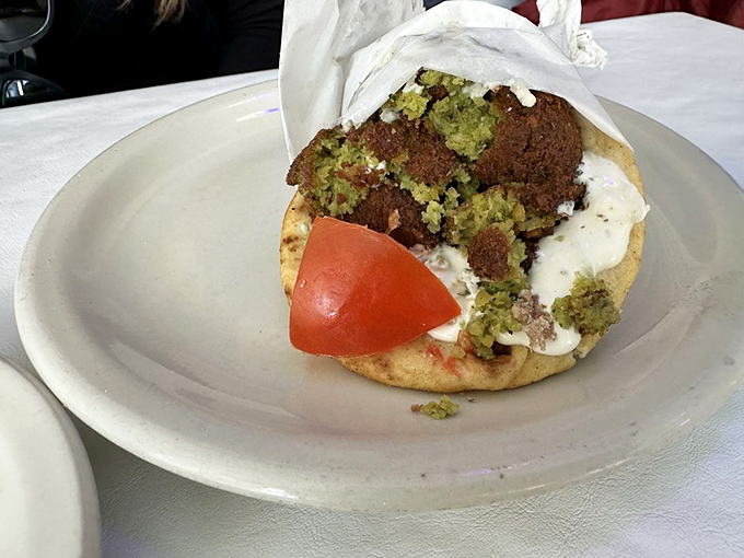 Falafel that could convert carnivores! These crispy, herb-packed chickpea patties nestled in warm pita are Middle Eastern magic.