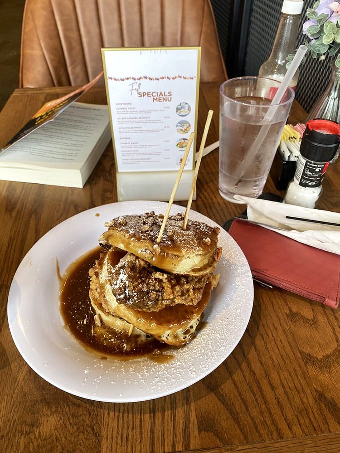 The pancake that ate Manhattan. This golden disc of joy, dusted with powdered sugar, is what breakfast dreams are made of.