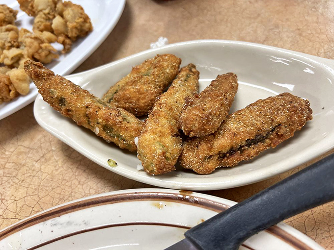 Fried okra: the Southern side dish that completes any seafood feast, providing the perfect crunchy counterpoint to tender fish.