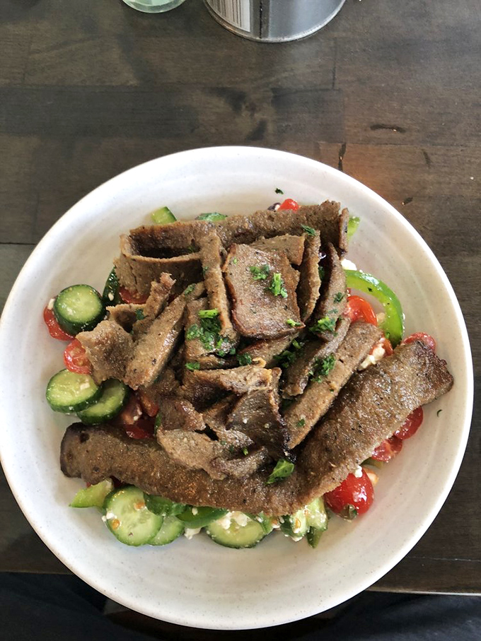 This Greek salad isn't just a side dish&mdash;it's a refreshing counterpoint to the richness of grilled meats, with each cucumber slice and tomato chunk bringing Mediterranean sunshine.