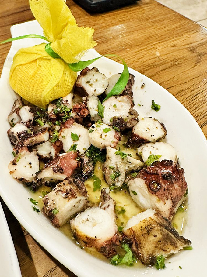 Octopus transformed from intimidating sea creature to a plate of chargrilled perfection that would make Poseidon himself request seconds.