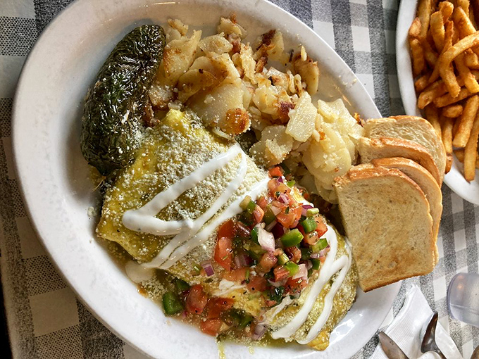 This verde omelette brings the garden to your plate with a blanket of salsa fresca. Breakfast with vacation vibes, no passport required.