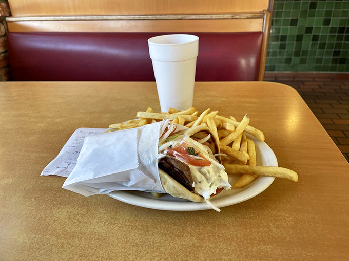 The gyro wrap—where Mediterranean dreams meet California casual in a handheld package that makes you wonder why you ever eat any other way.