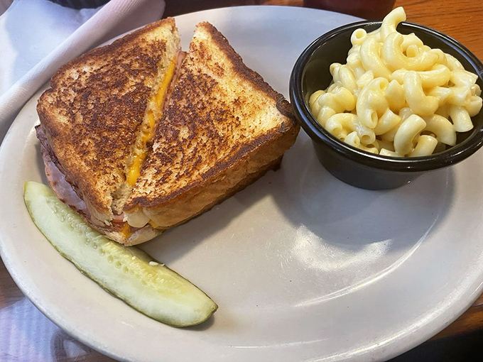 The grilled cheese sandwich that time forgot &ndash; perfectly golden, oozing with melted cheese, with mac and cheese sidekick that refuses to be upstaged.
