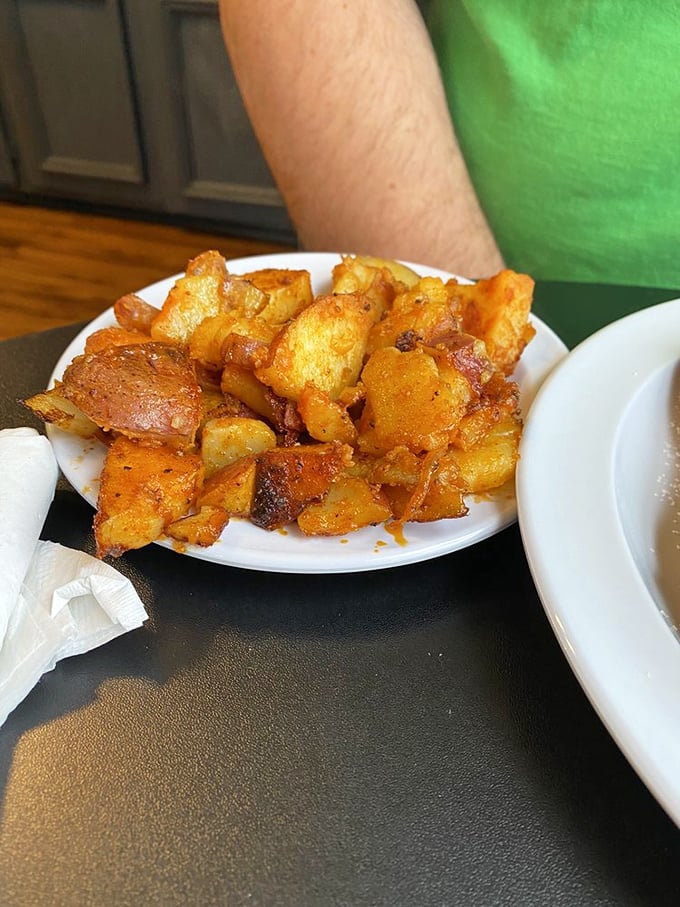 Home fries that have achieved that mythical balance &ndash; crispy edges, tender centers, and seasoned by someone who understands potato perfection.