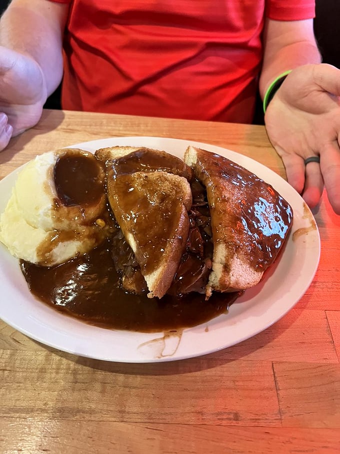 Hot roast beef sandwich swimming in gravy&mdash;the kind of comfort food that makes you want to call your mother and thank her for everything.