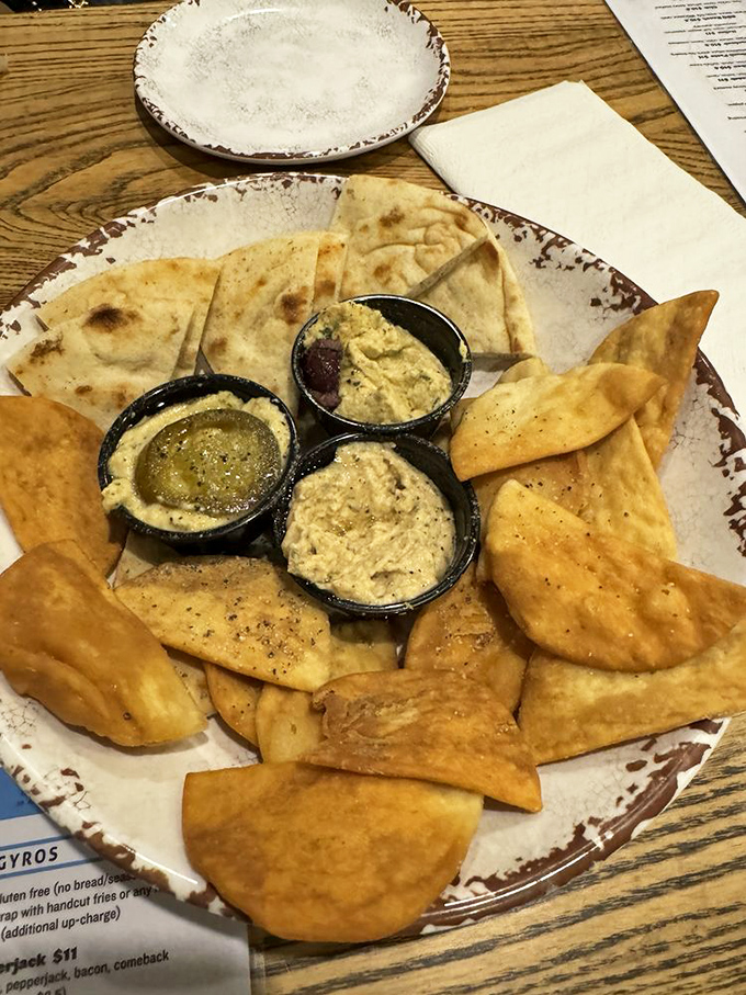 The hummus trio is like the Supremes of appetizers&mdash;three distinct personalities creating perfect harmony on a plate of crispy pita chips.