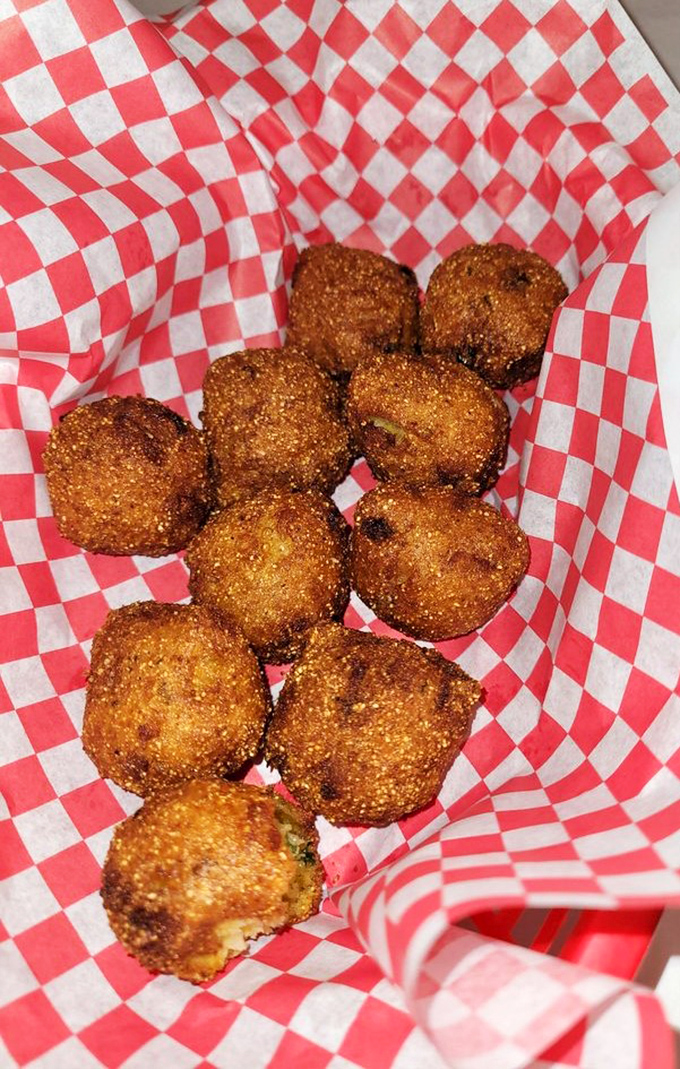 Hushpuppies so perfectly golden they deserve their own trophy&mdash;crispy exterior giving way to a tender, savory interior.