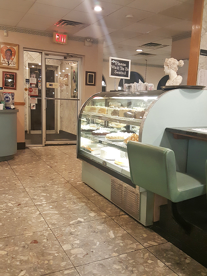 The dessert case beckons like a siren song near the entrance – a strategic placement that ensures you'll be thinking about pie throughout your entire meal.