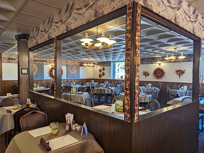 Wood paneling and dividers create intimate dining spaces &ndash; the architectural equivalent of a warm Wisconsin hug.