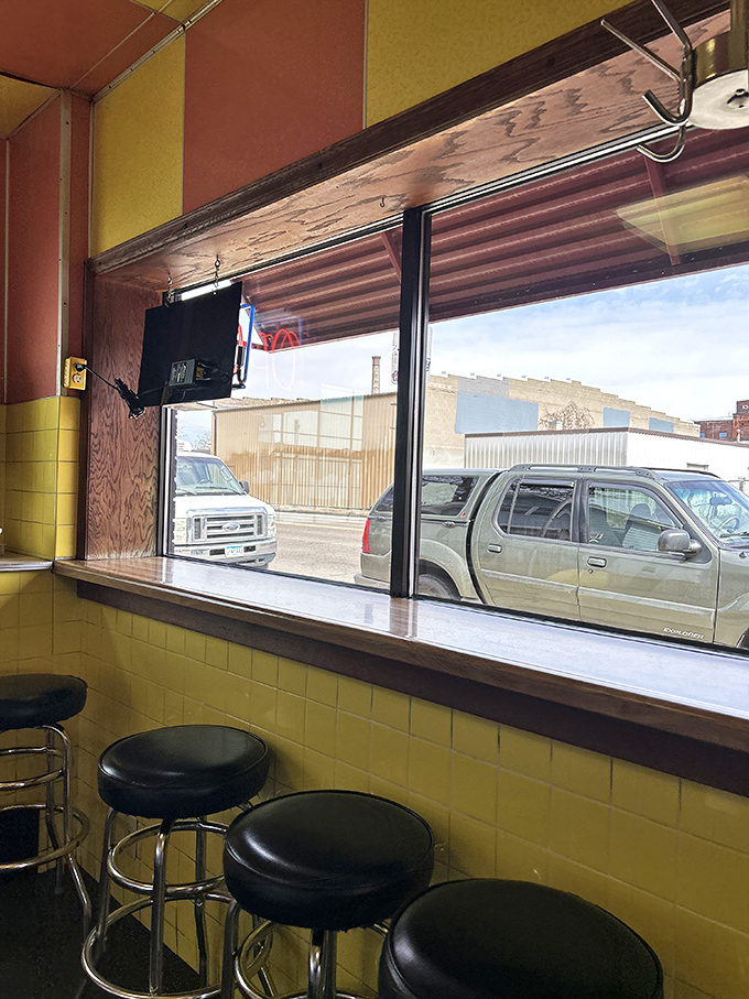 Counter seating where conversations flow as freely as the coffee refills and nobody checks their phone.