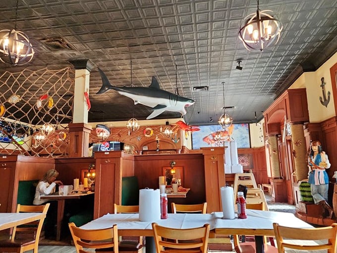 That shark hanging from the ceiling isn't just decoration&mdash;it's keeping an eye on who's enjoying their seafood properly.