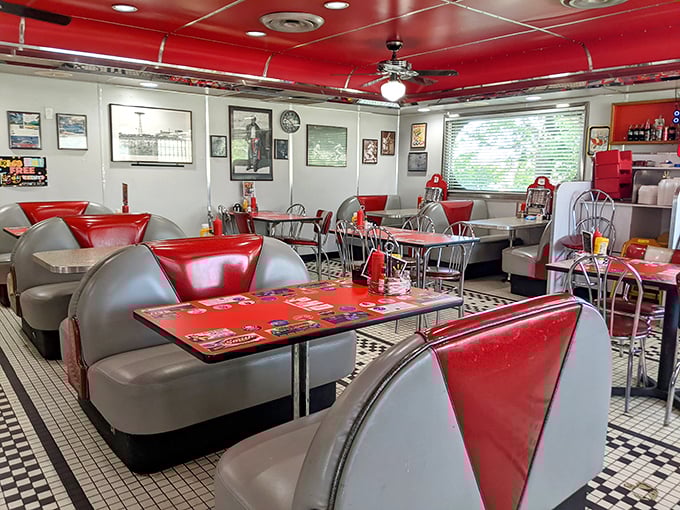 Classic diner counter seating where conversations flow as freely as the coffee refills do.