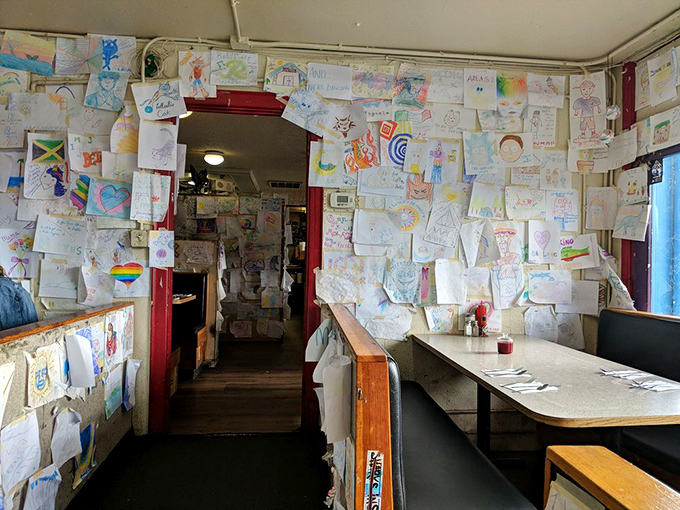 Every inch of wall space tells a story&mdash;a living museum of customer creativity that's been accumulating like delicious layers in a perfectly built club sandwich.