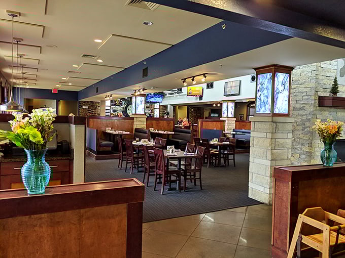 Where stone meets wood meets comfort. The dining room feels like someone designed it specifically for lingering conversations.