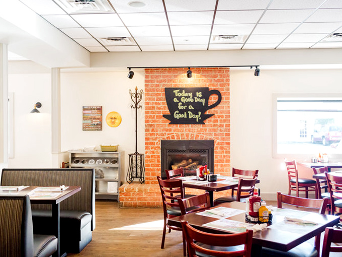 The brick fireplace with its coffee cup sign reminds us that "Today is a good day for a good day." Truer words were never written.