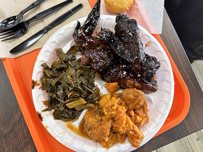 Collard greens cooked low and slow, yams sweet as candy, and meat so tender it practically surrenders at the sight of your fork.