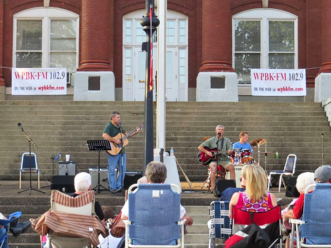 Live music on courthouse steps&mdash;where the audience brings lawn chairs and nobody's watching through phone screens. Now that's entertainment.