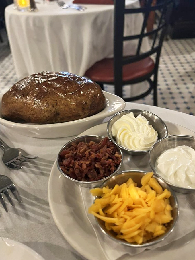 The loaded baked potato&mdash;where butter, cheese, bacon, and sour cream hold their annual board meeting on a fluffy spud.