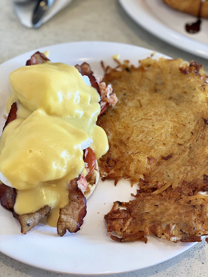 Eggs Benedict elevated to art form&mdash;that hollandaise sauce looks so perfect it could make a grown breakfast lover weep with joy.