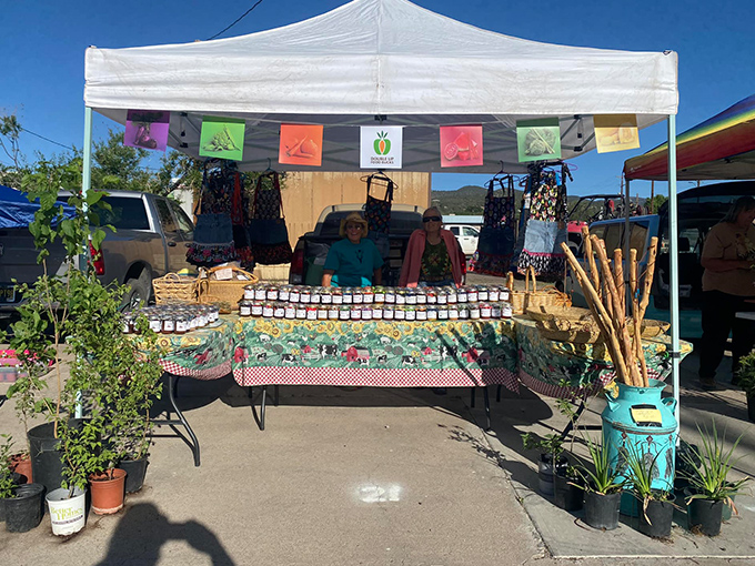 The farmers market transforms parking lots into community gathering spots where homemade salsa and local honey become conversation starters.