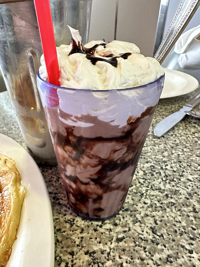 This isn't just a milkshake&mdash;it's a tower of childhood memories topped with whipped cream and a side of zero regrets.