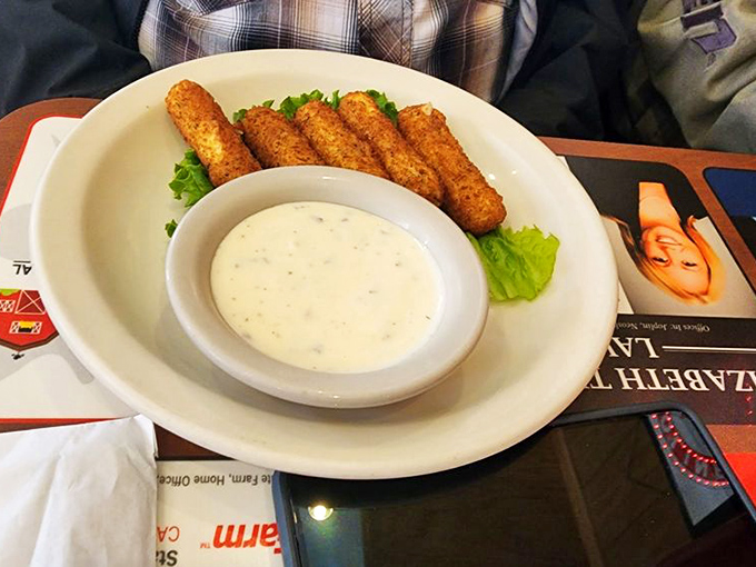 Golden-fried mozzarella sticks with ranch dipping sauce&mdash;because sometimes breakfast needs an appetizer too, especially after a long night.