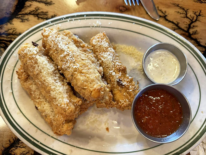 These aren't your freezer aisle mozzarella sticks&mdash;they're golden-brown ambassadors of cheese with diplomatic immunity from your diet.