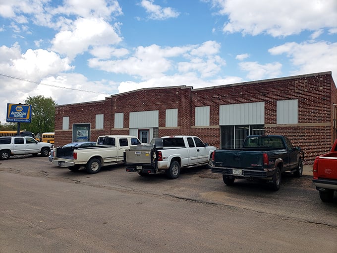 Behind these brick walls and pickup trucks lies the beating heart of rural commerce&mdash;where farmers and townspeople have gathered for generations.
