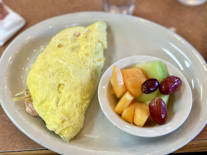 This omelet manages to be both cloud-like and substantial&mdash;paired with fresh fruit that doesn't feel like an afterthought.