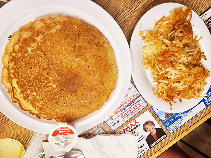 This pancake isn't just large&mdash;it's the size of a small Ohio county, with hash browns that could feed a family of four.