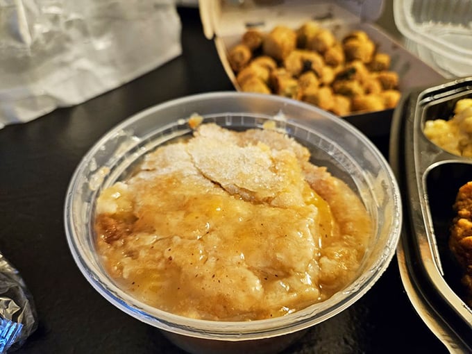 Peach cobbler so good it should be Georgia's official state dessert. That perfect balance of fruit, crust, and sweet syrup.