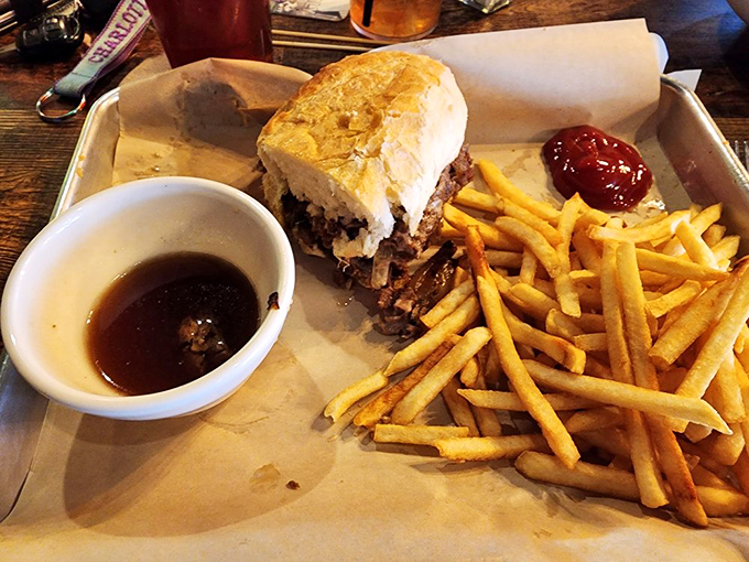 A French dip that's gone rogue—tender meat, golden fries, and a dipping sauce that deserves its own backstage pass.