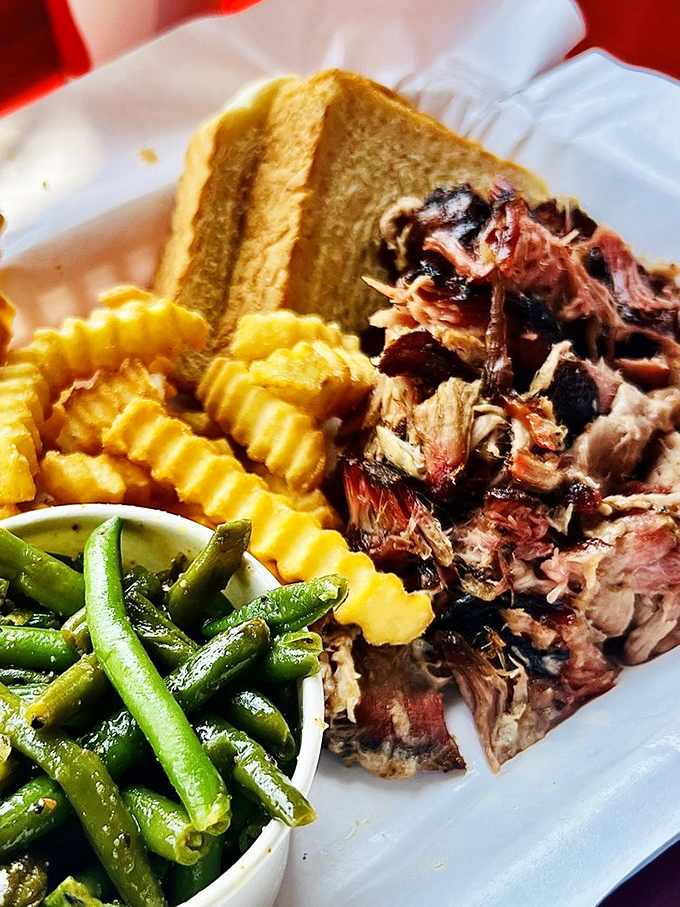 Pulled pork that's been coaxed, not forced, into tender submission. Paired with green beans and cornbread, it's the South's greatest diplomatic achievement.