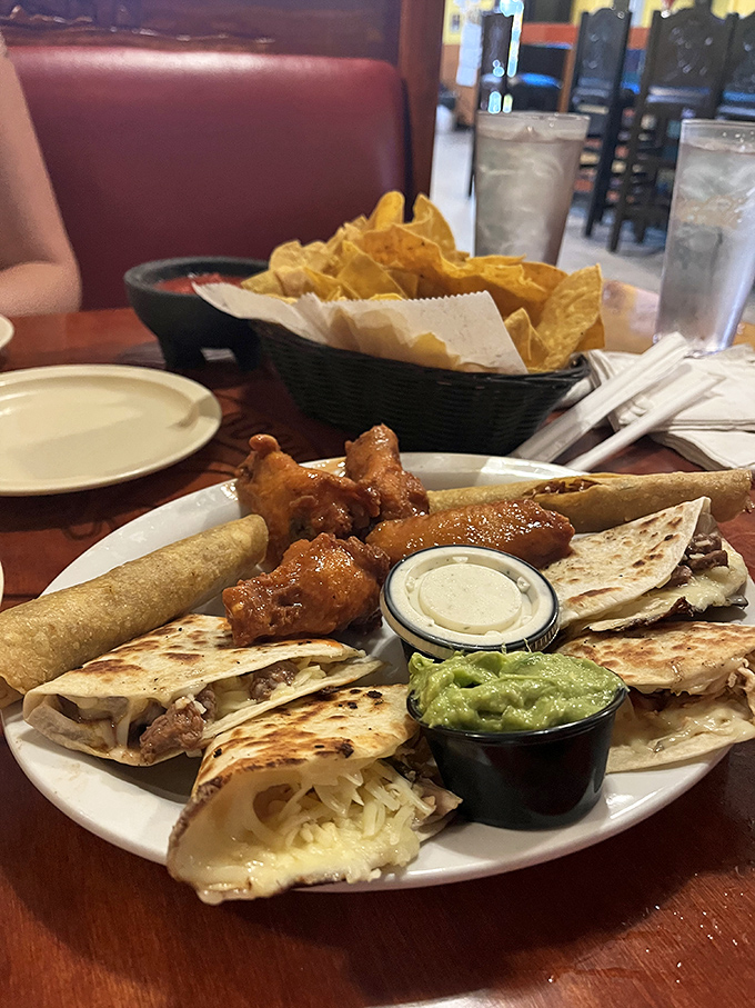 Not just any quesadilla&mdash;a fiesta of melted cheese, perfectly grilled meat, and that essential side of guacamole for dipping.