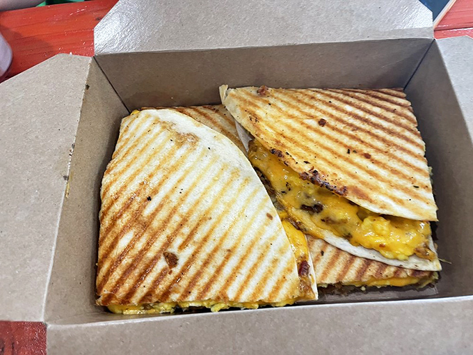 A quesadilla so perfectly grilled it makes you wonder if the chef moonlights as a geometry teacher. Golden ratio, indeed.