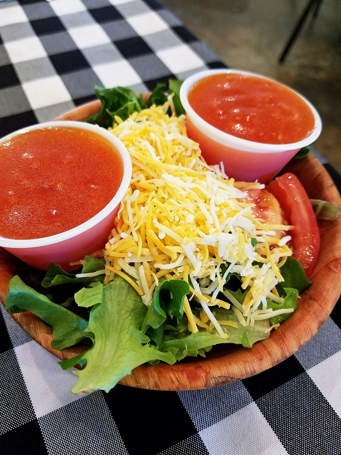Even the side salad gets the homestyle treatment&mdash;fresh greens, shredded cheese, and those little cups of dressing that somehow always contain exactly the right amount.