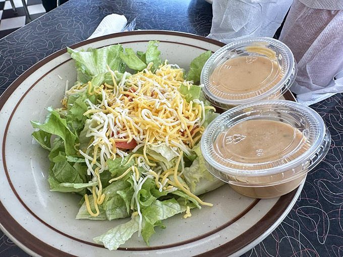 Even the salad comes with a Midwestern generosity&mdash;cheese sprinkled with abandon and dressing served properly on the side.