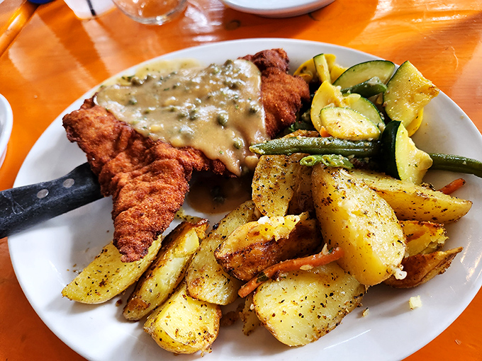 Schnitzel that's been pounded thin, breaded thick, and fried to a golden-brown perfection that would make your European grandmother nod in approval.
