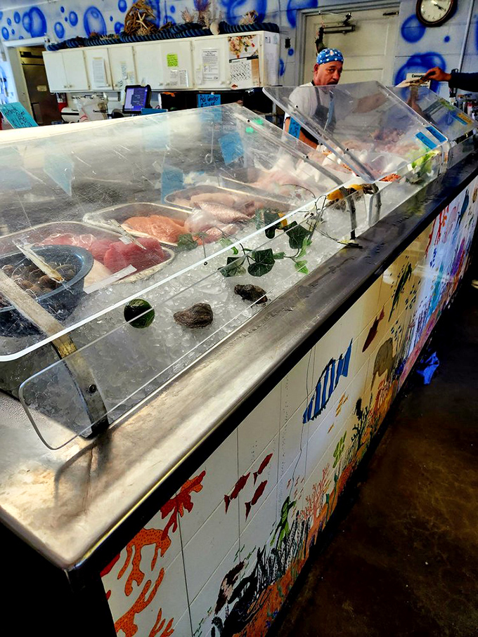 The seafood case&mdash;where decisions become impossible and dreams come true. Each glistening filet tells a story of dawn fishing trips.