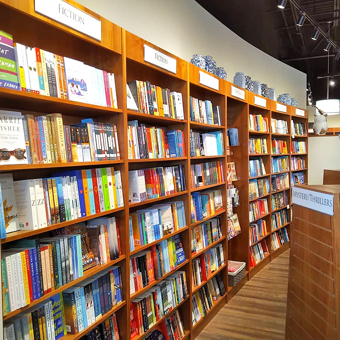 The fiction section stretches like a literary buffet, each spine a different flavor of story waiting to be savored. 